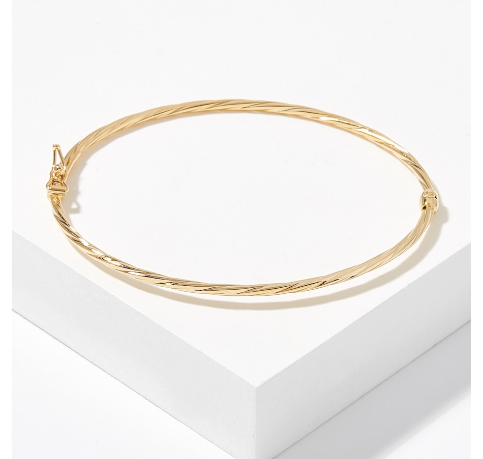 UNOAERRE 18K Yellow Gold Twisted Tube Bangle - TSC.ca