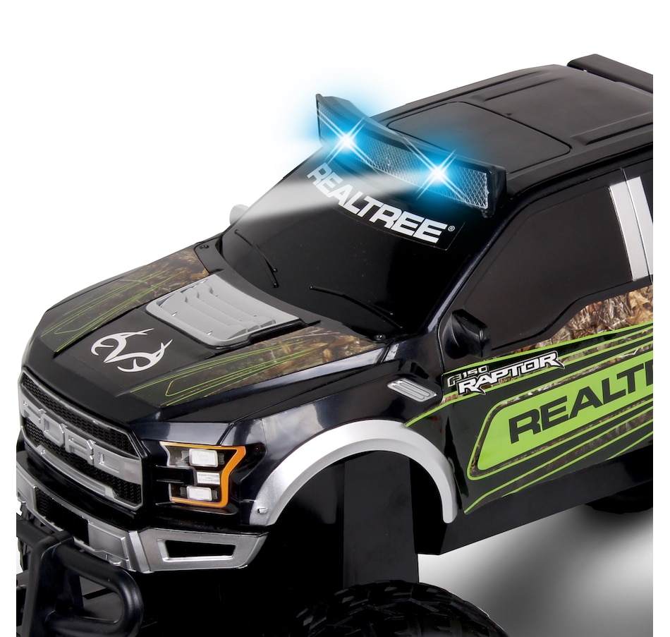 NKOK 14"L RealTree Ford F-150 Raptor (black) 1:14 Scale - TSC.ca